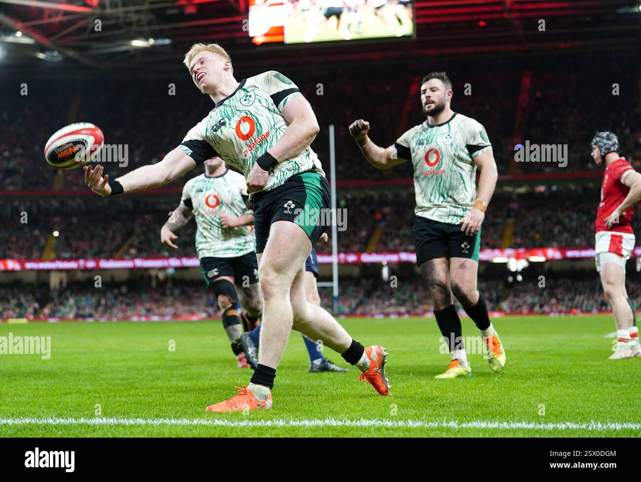 Ireland's Jamie Osborne celebrates scoring their side's second try of ...