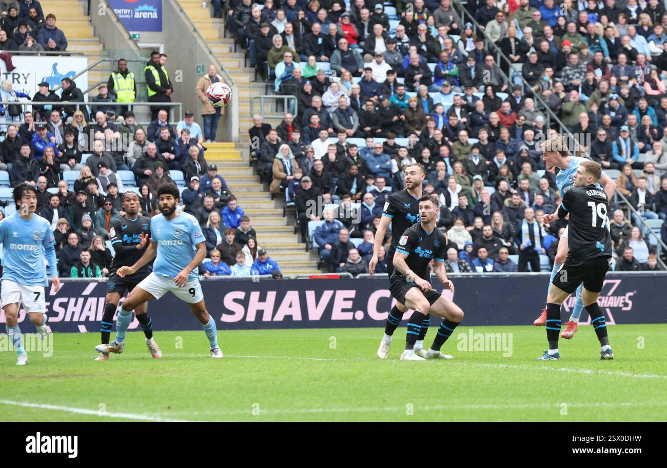 Coventry City's Jack Rudoni (second from right) scores their side's ...