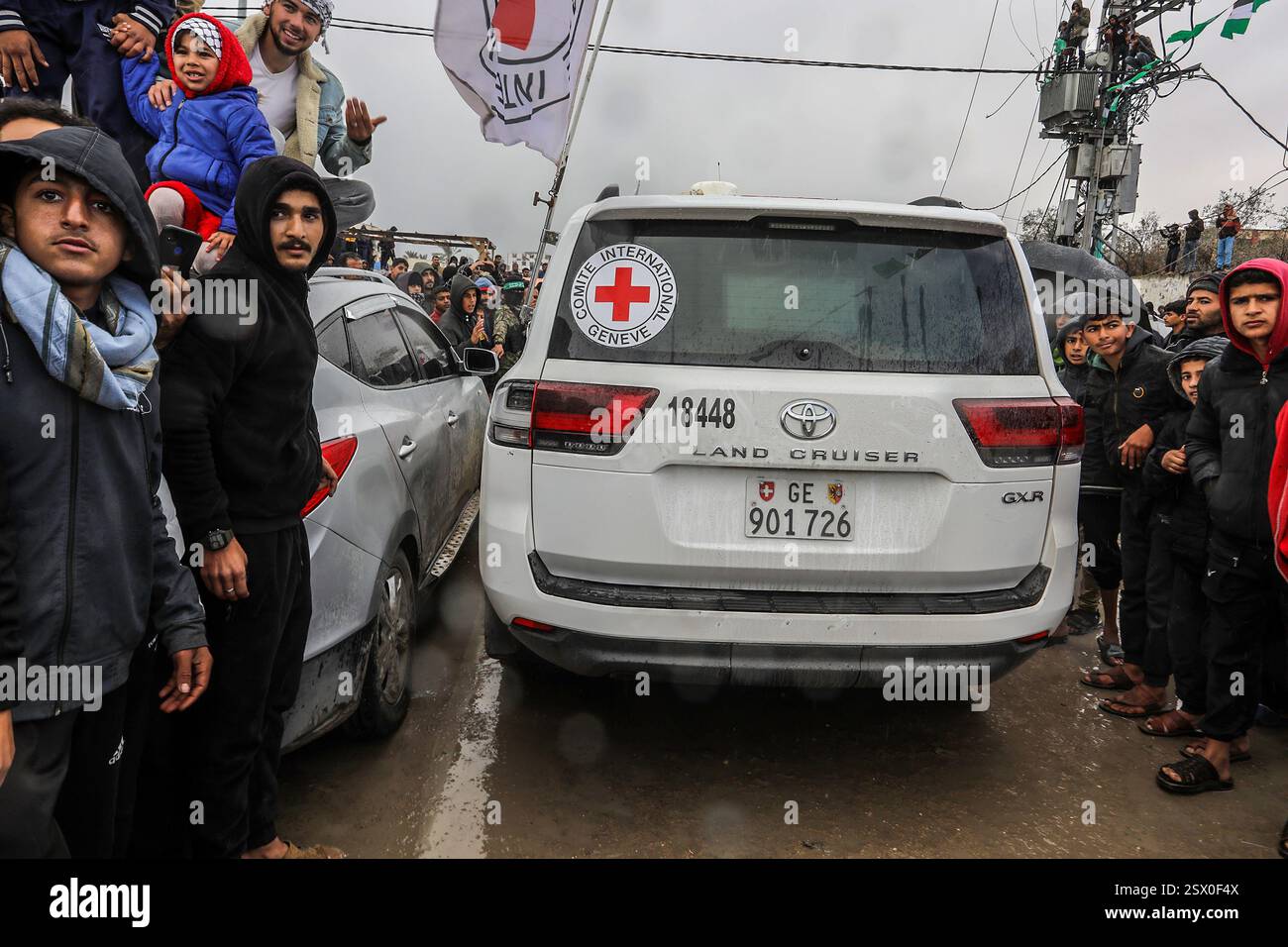 Rafah, Gaza. 22nd Feb, 2025. International Red Cross vehicles arrive at ...