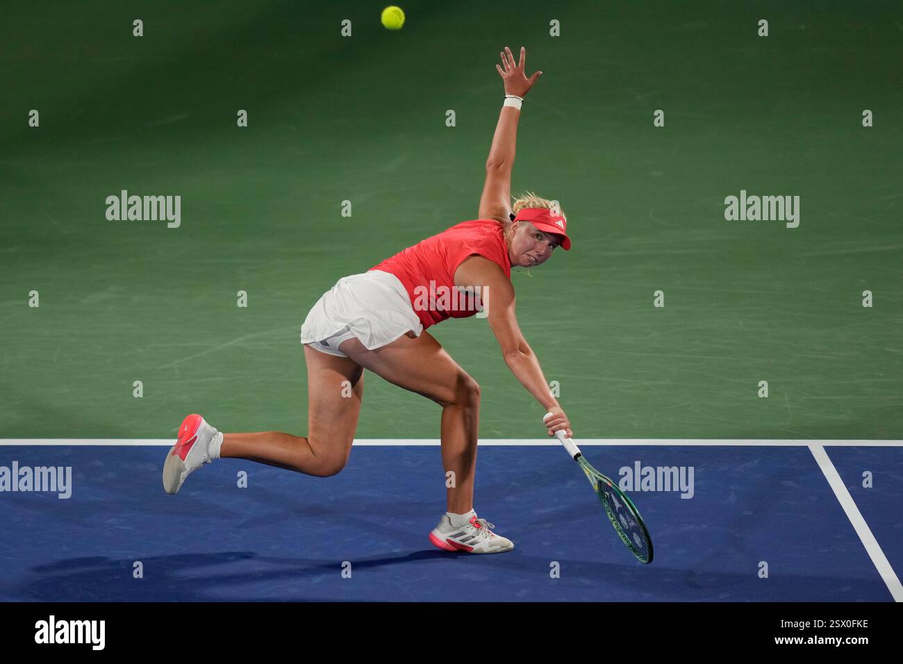 Denmark's Clara Tauson returns to Russia's Mirra Andreeva during the ...