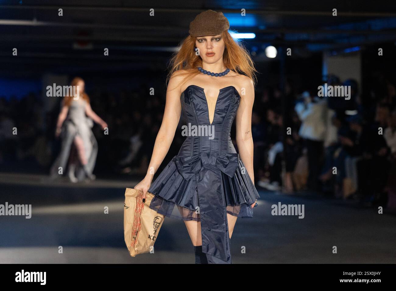 London, UK. Saturday February 22, 2025. A model on the catwalk at the ...