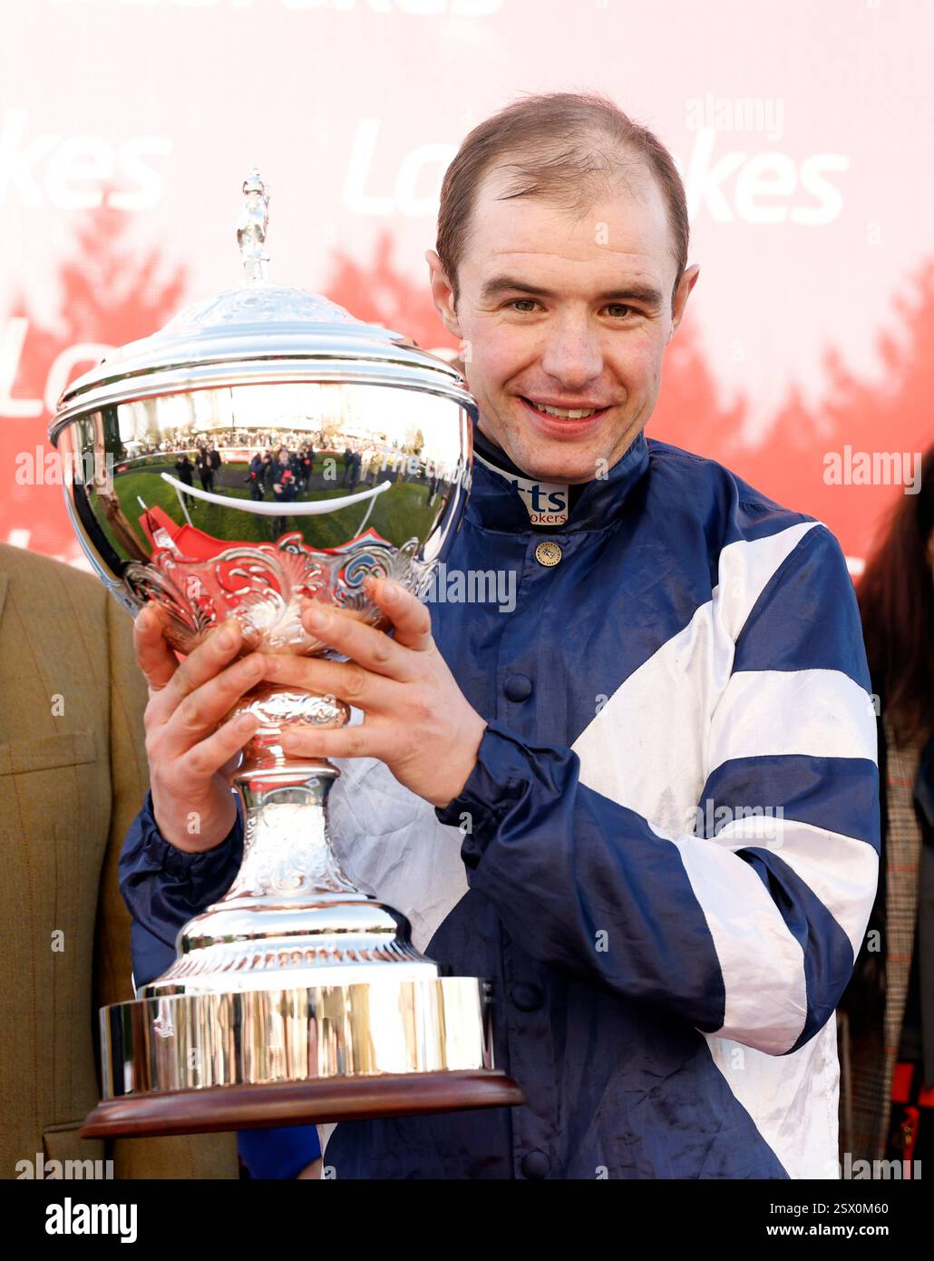 Jockey Charlie Deutsch after winning the Ladbrokes Trophy Handicap ...
