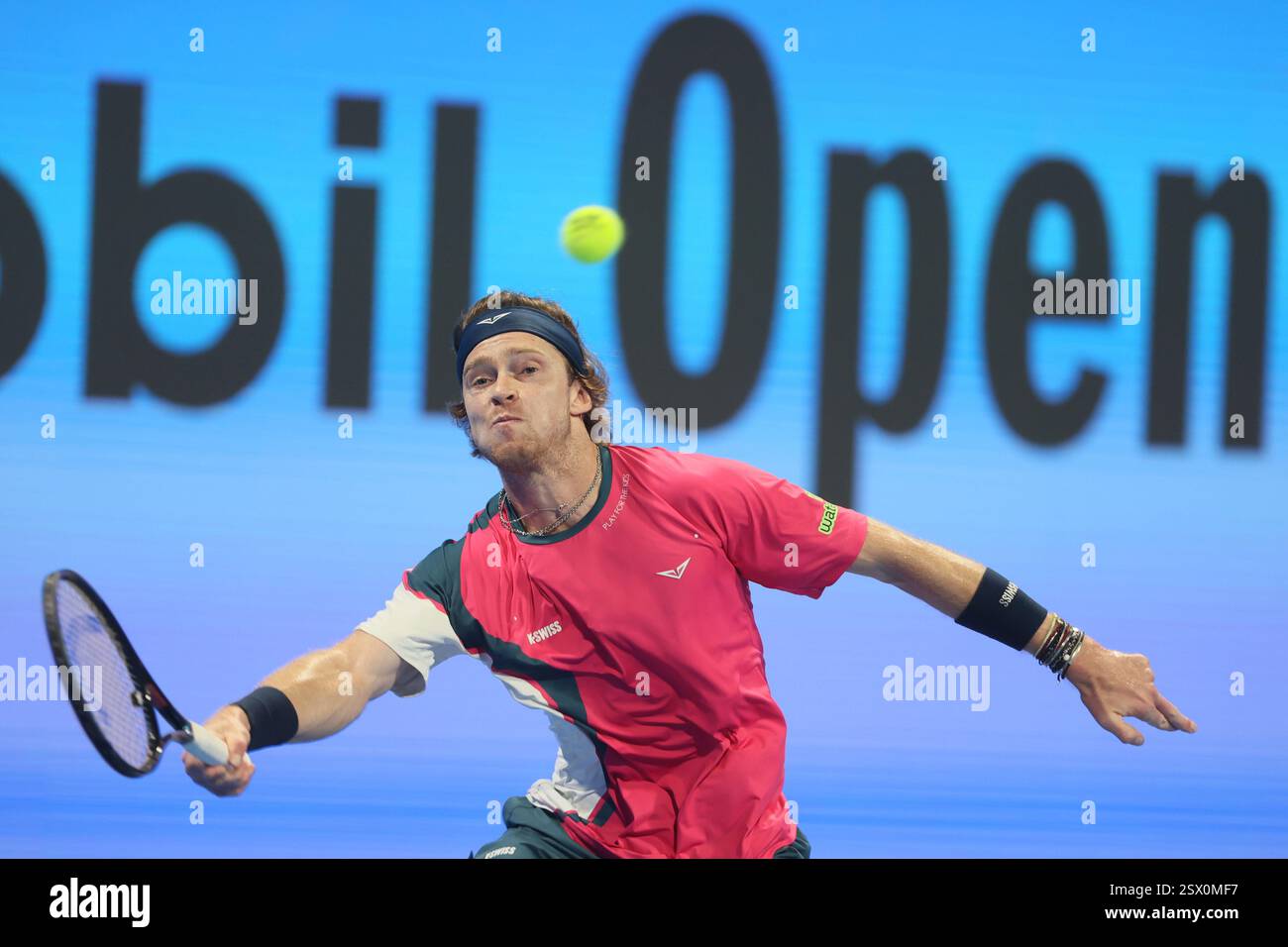 Russia's Andrey Rublev plays a shot against Britain's Jack Draper ...
