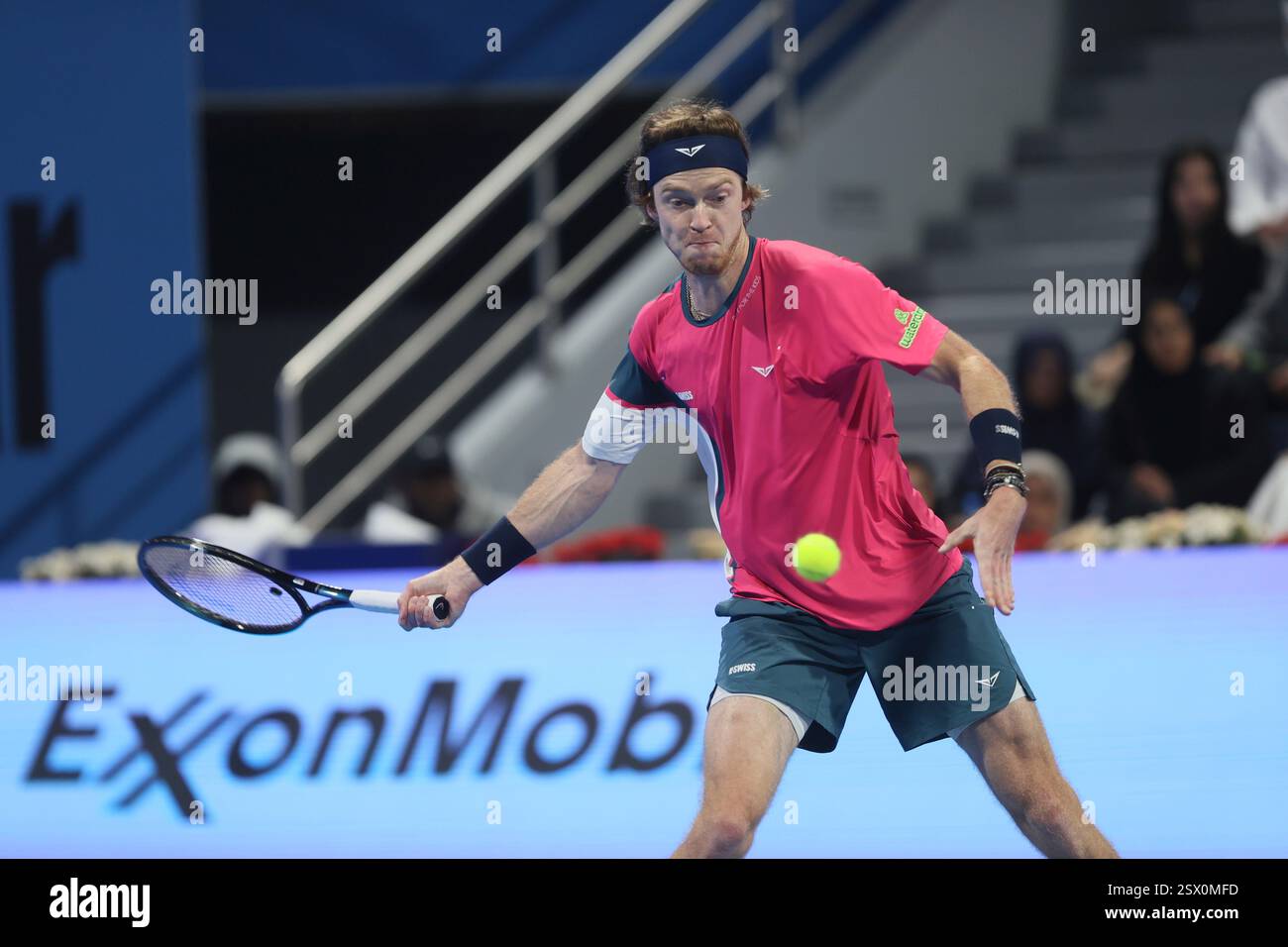Russia's Andrey Rublev plays a shot against Britain's Jack Draper ...