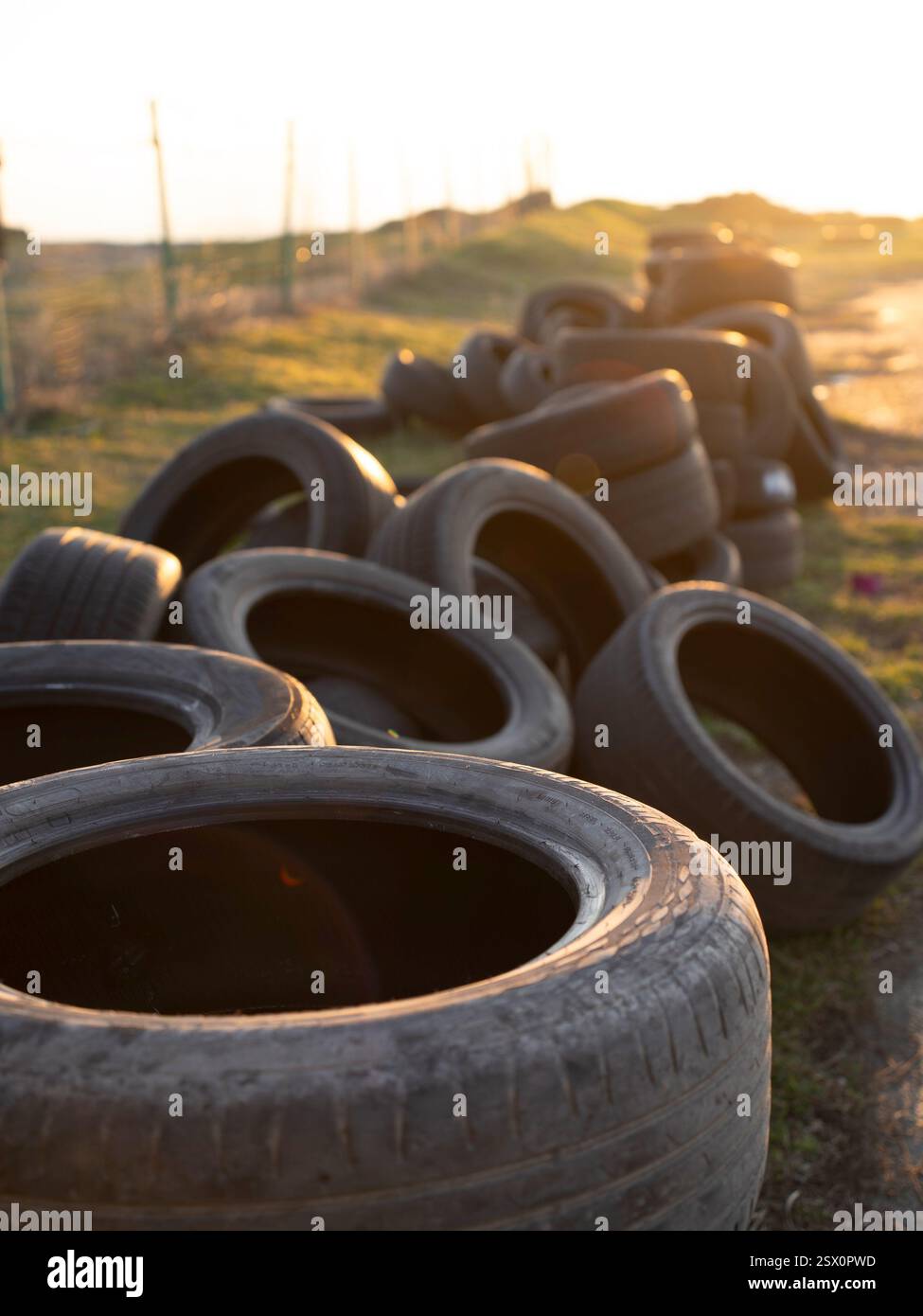 rubber recycling car tire old wheels waste stack Stock Photo - Alamy
