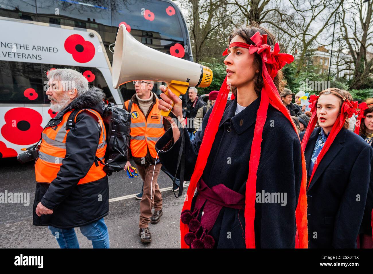 London, UK. 22nd Feb, 2025. Passing a Royal British Legion liveried ...