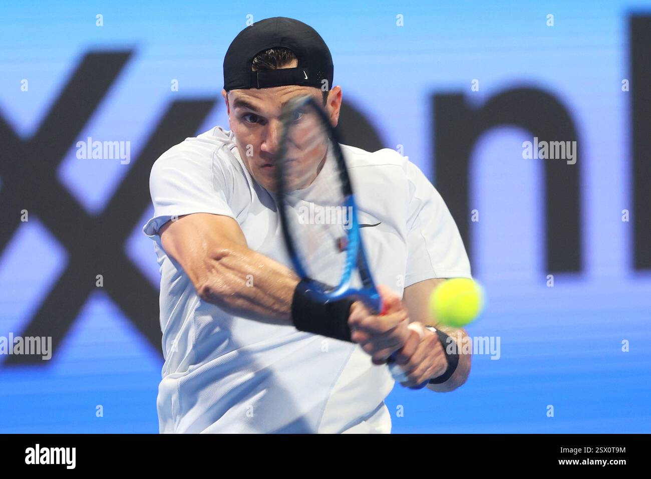 Britain's Jack Draper plays a shot against Russia's Andrey Rublev ...