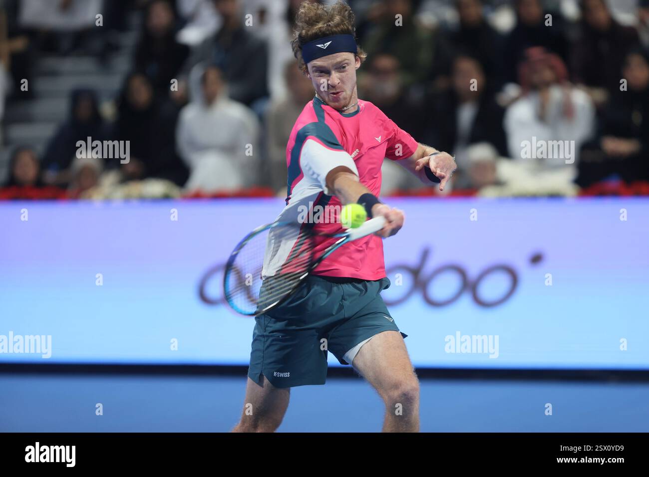 Russia's Andrey Rublev plays a shot against Britain's Jack Draper ...