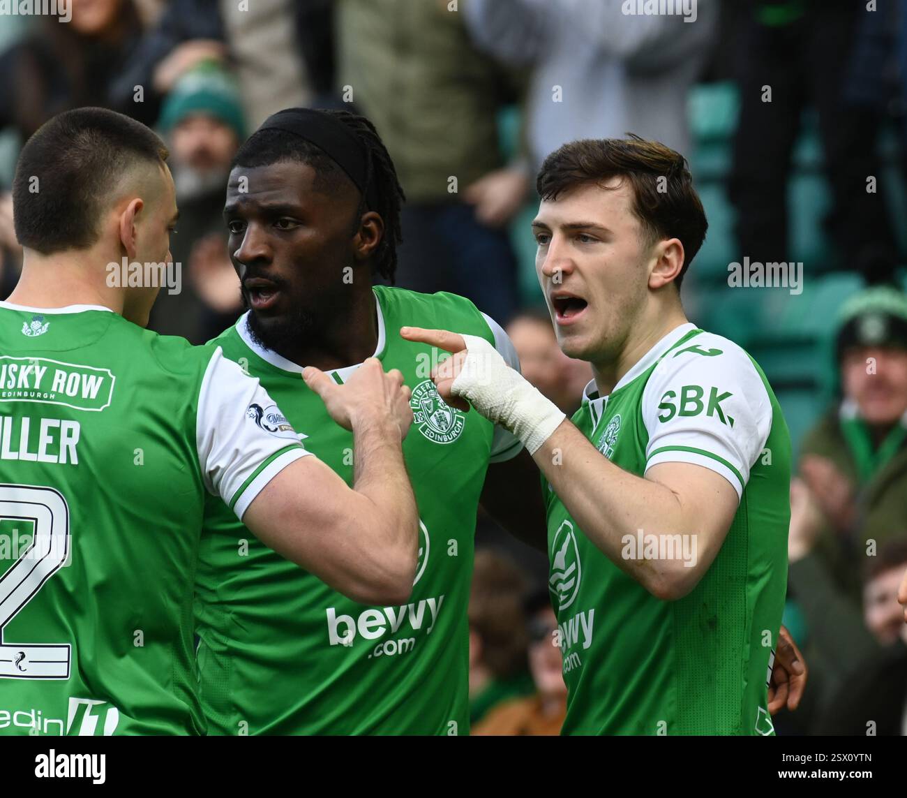 Hibs rocky bushiri celebrates with two goal hero josh campbell hi-res ...