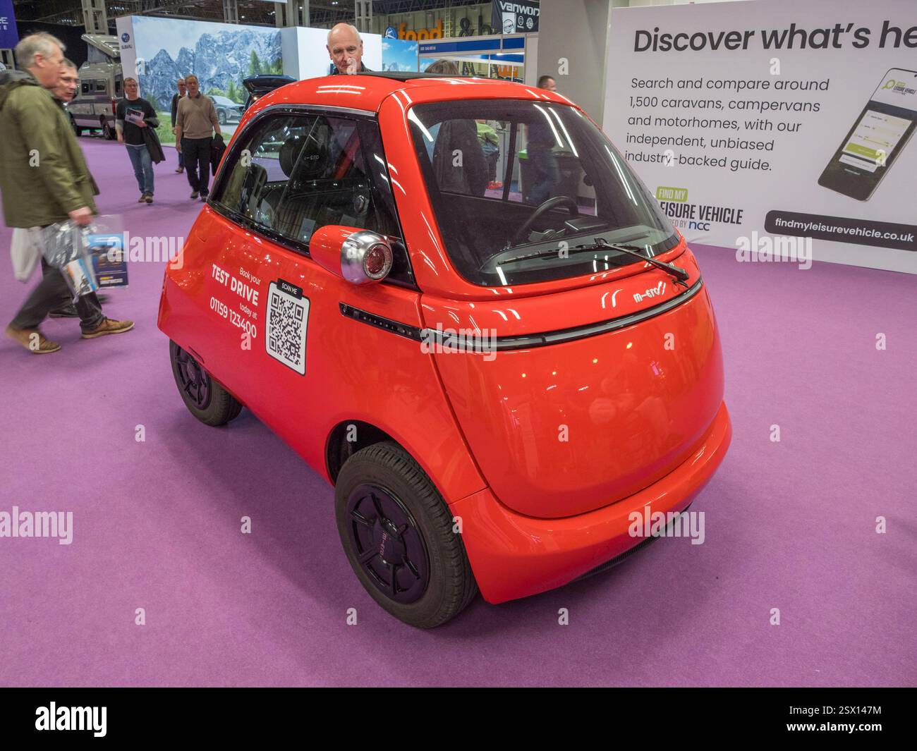 A Microlino m-ero electric bubble car on display at the NEC Birmingham ...
