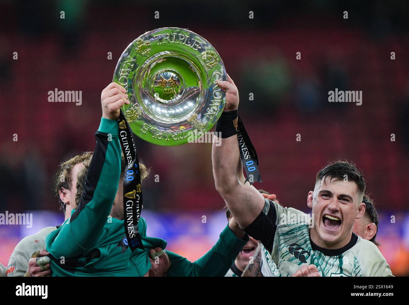 Ireland's Dan Sheehan lifts the Triple Crown trophy after the Guinness ...