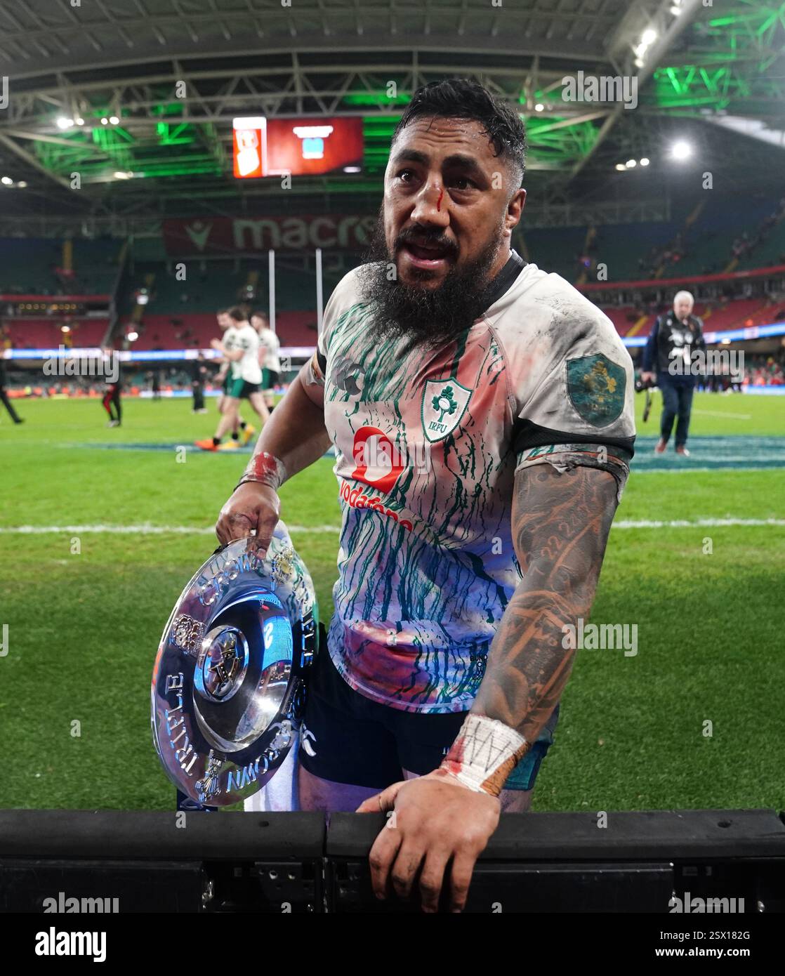 Ireland's Bundee Aki with the Triple Crown following the Guinness Men's Six Nations match at the ...