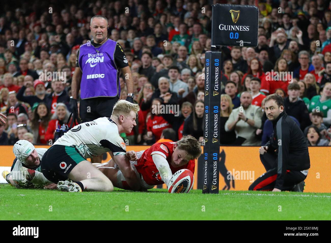 Cardiff, UK. 22nd Feb, 2025. Ellis Mee of Wales ‘scores ‘ a try late in the game but it is ...