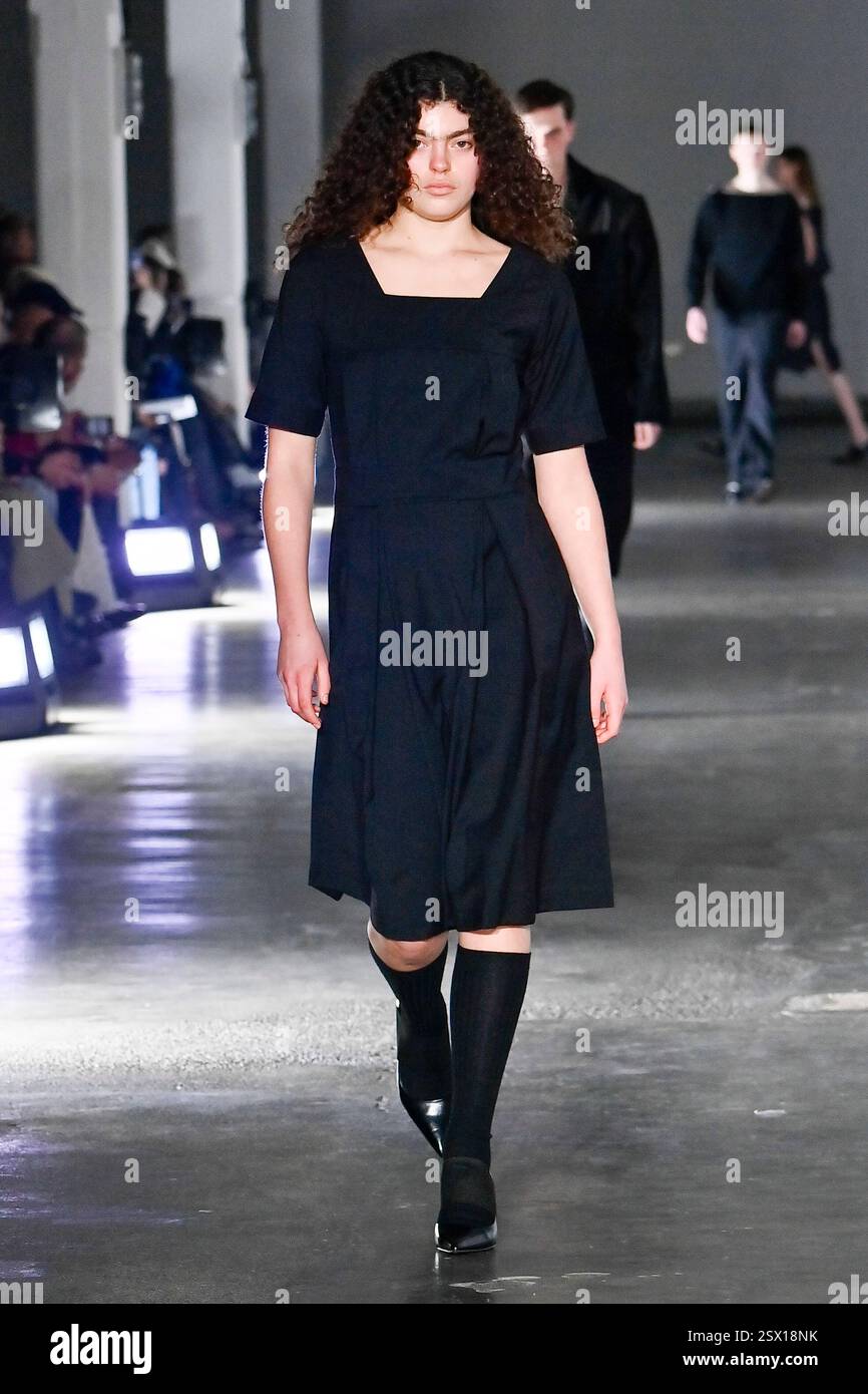 London, UK. 21st Feb, 2025. A model is seen on the runway during the ...