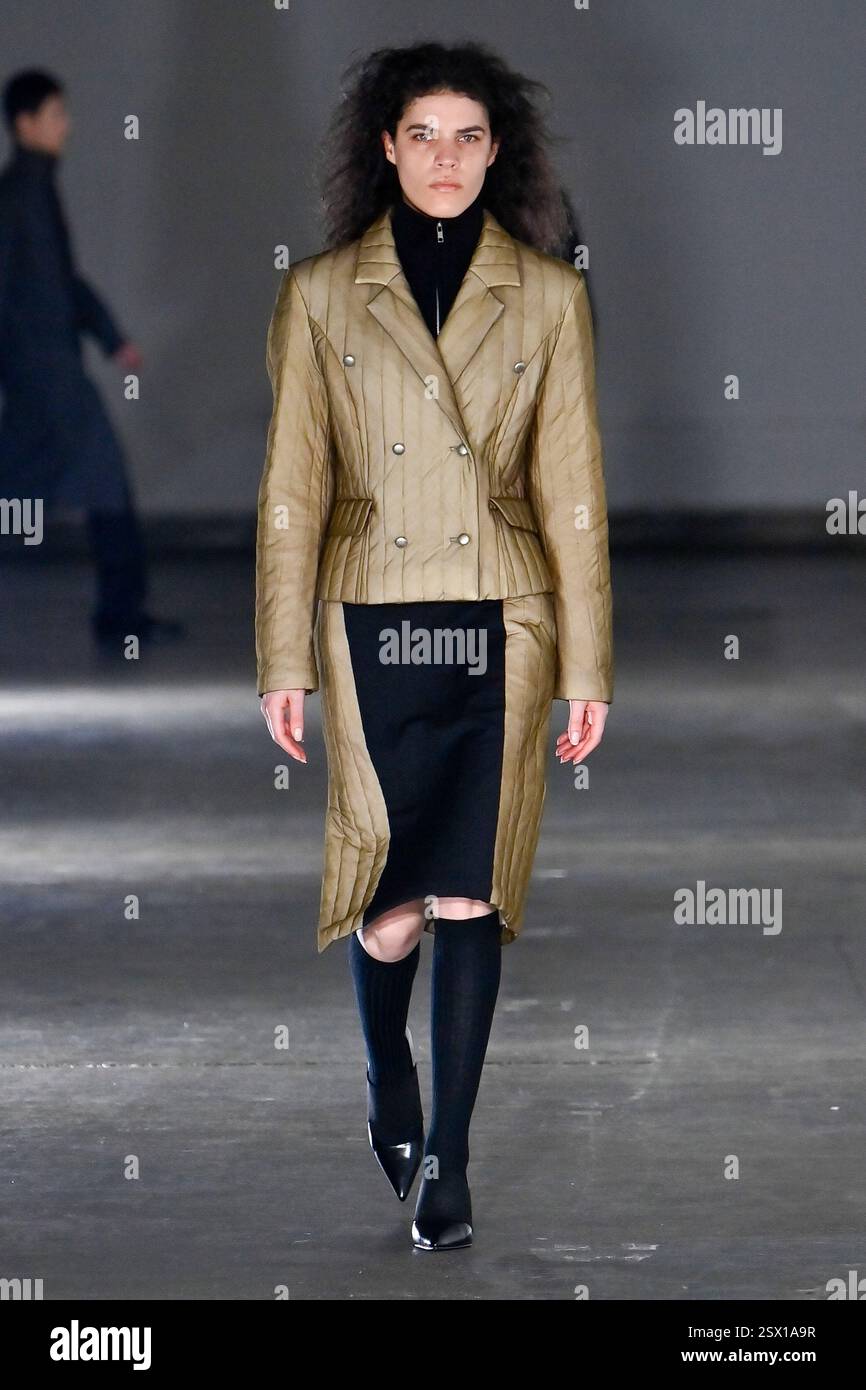 London, UK. 21st Feb, 2025. A model is seen on the runway during the ...