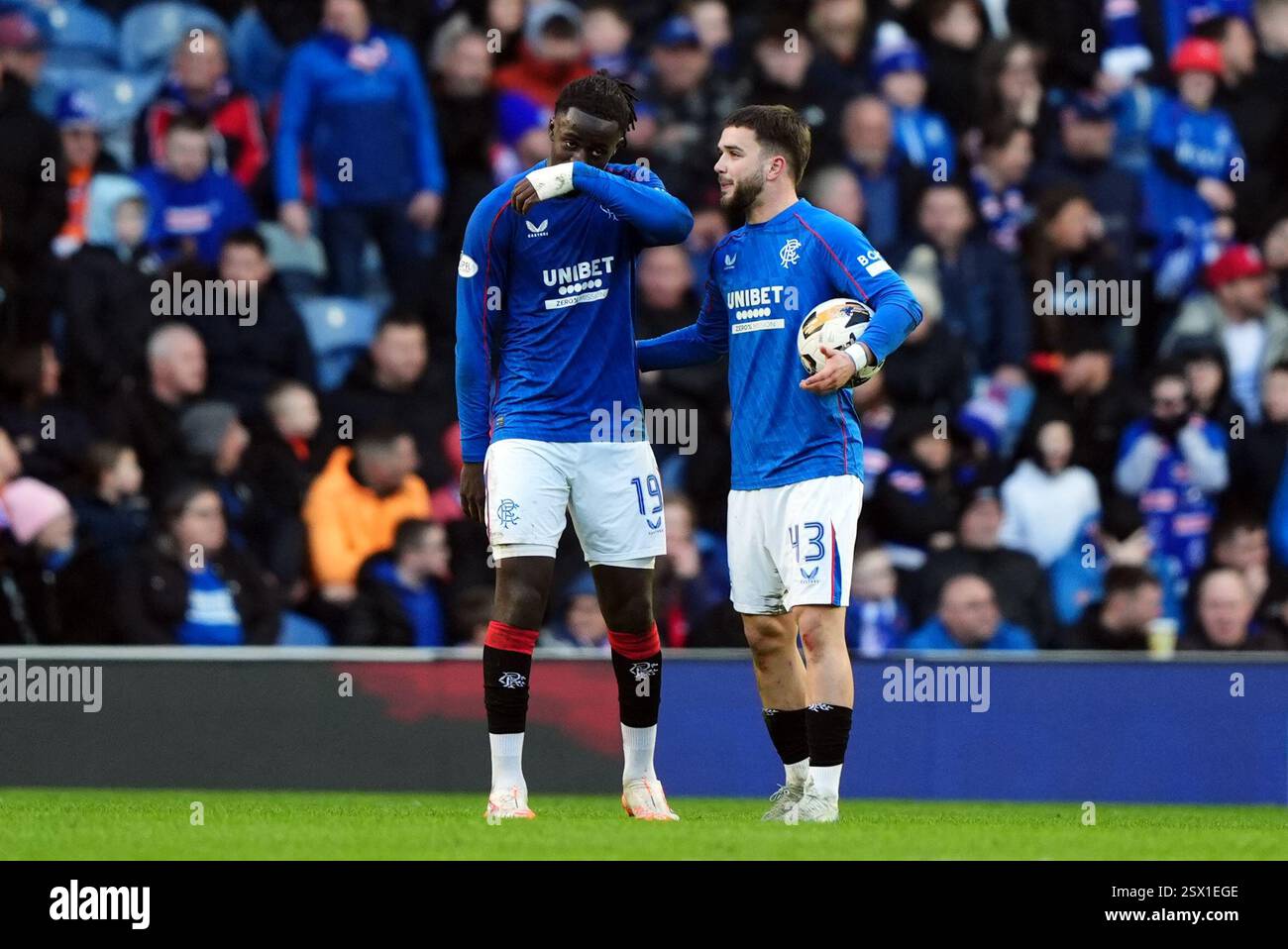 Rangers' Clinton Nsiala-Makengo and Nicolas Raskin stand dejected after ...