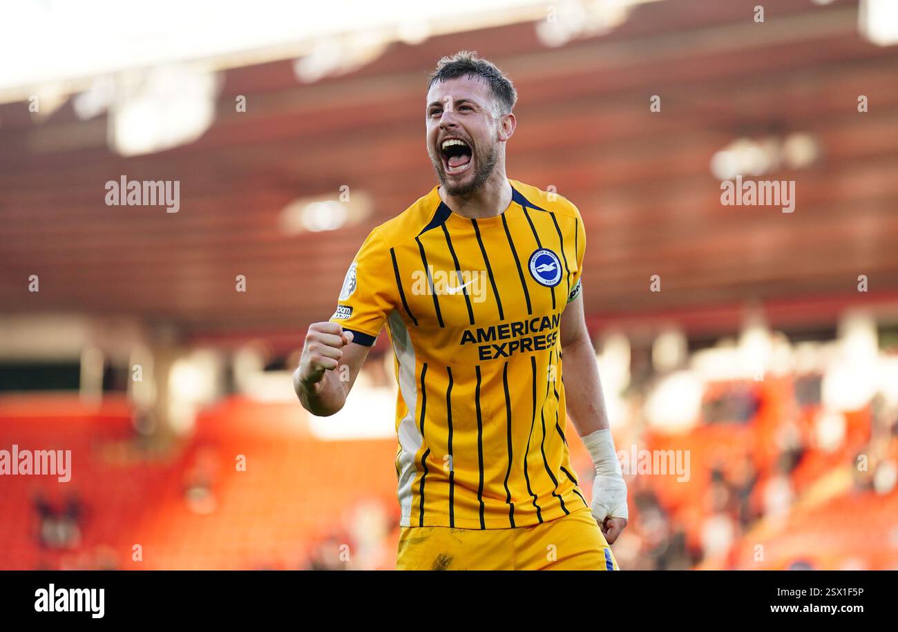 Brighton and Hove Albion's Adam Webster celebrates the win after the ...