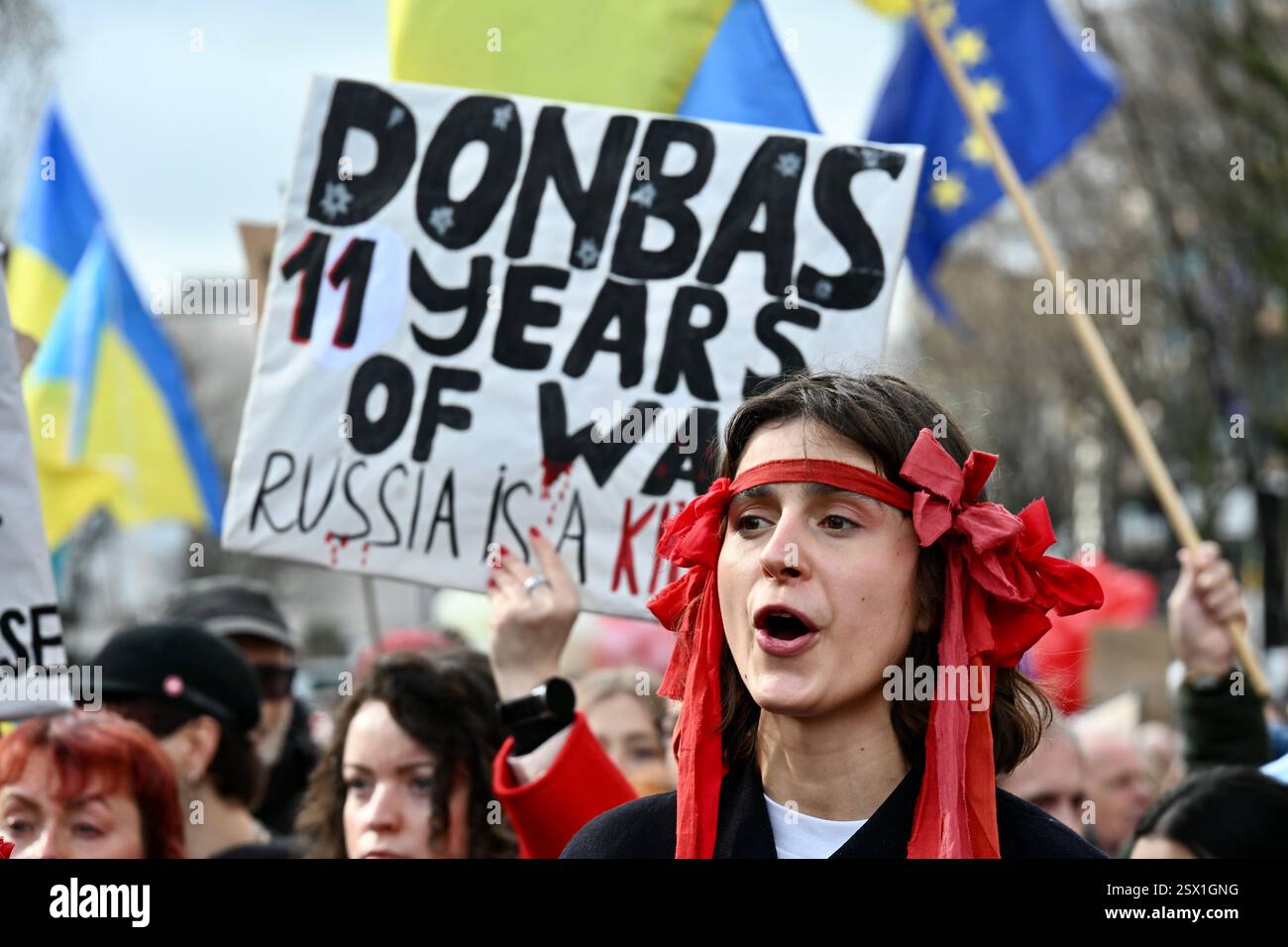 London, UK. Ukrainian singers from the Hromada Choir. Activists marched ...
