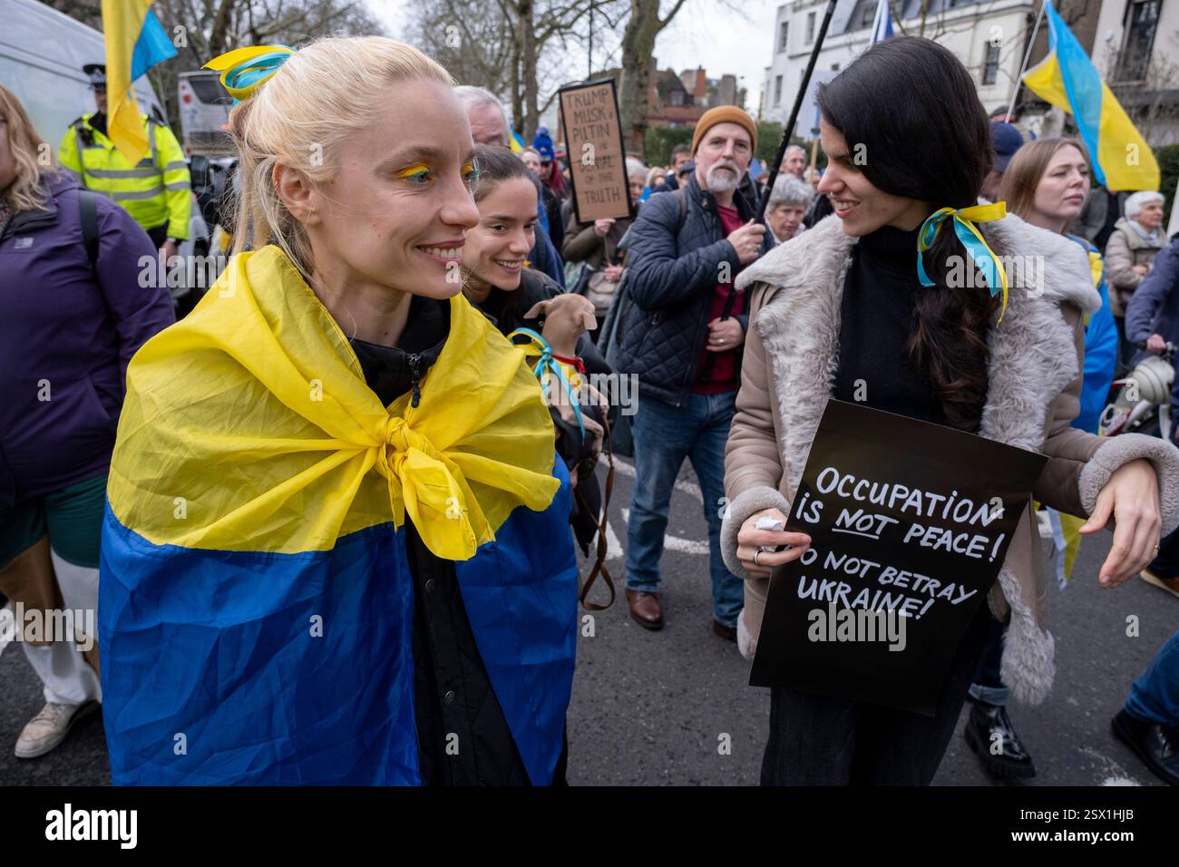 Occupation is not peace placard as Ukrainians and supporters of Ukraine ...