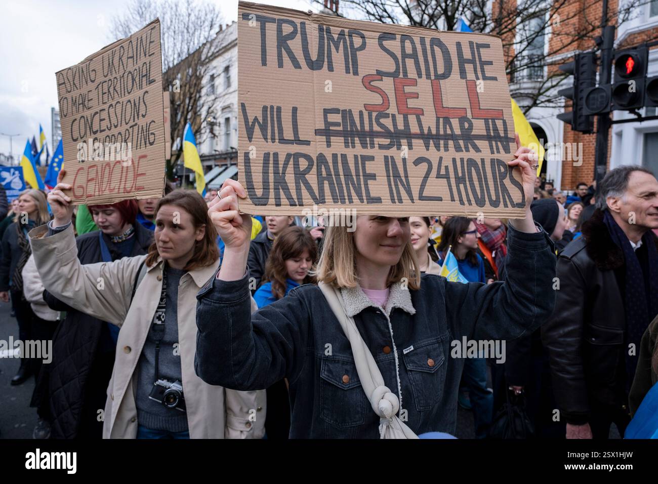 Ukrainians and supporters of Ukraine gather to march towards the ...
