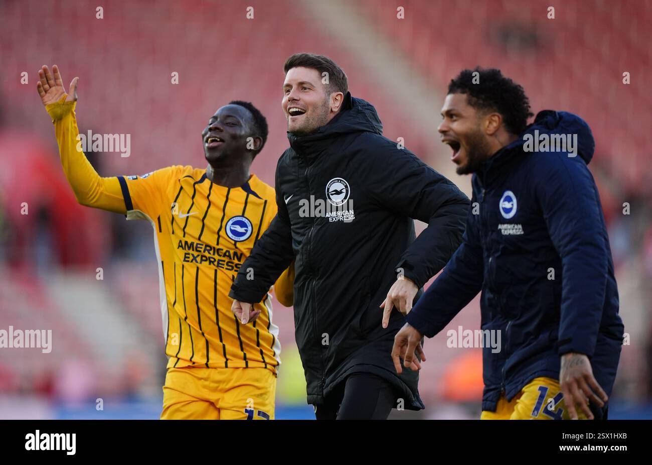 (left to right) Brighton and Hove Albion's Yankuba Minteh, manager ...