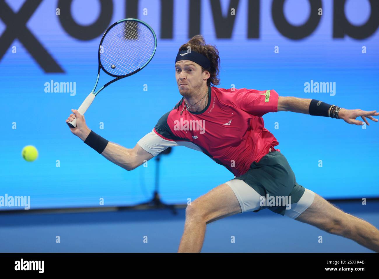Russia's Andrey Rublev plays a shot against Britain's Jack Draper ...