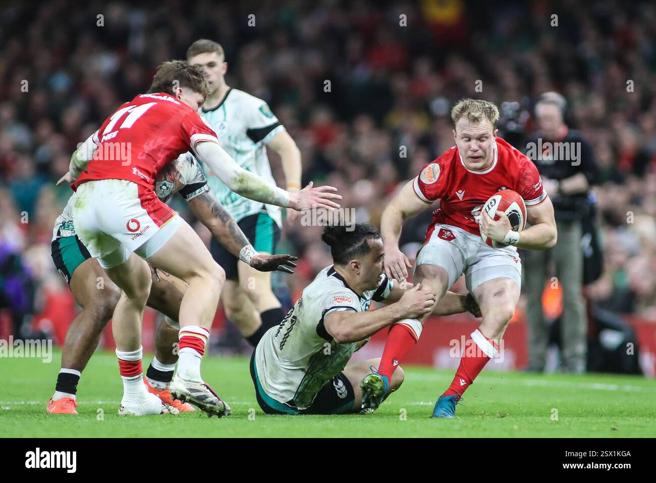 Blair Murray of Wales is tackled by James Lowe of Ireland during the 2025 Guinness 6 Nations ...