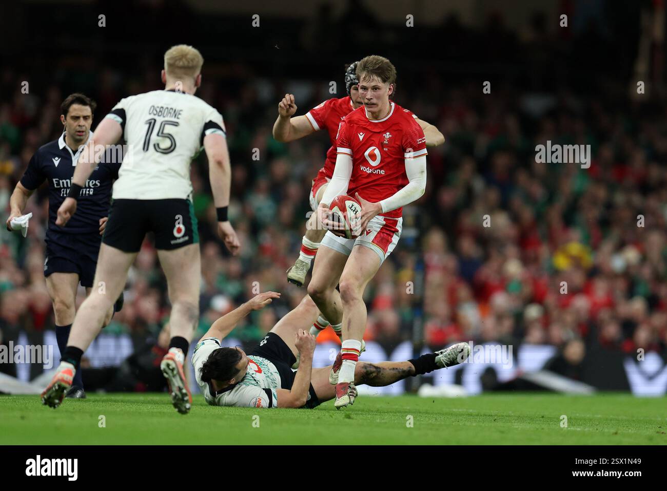 Ellis Mee of Wales makes a break past James Lowe of Ireland. . Guinness Six Nations championship ...