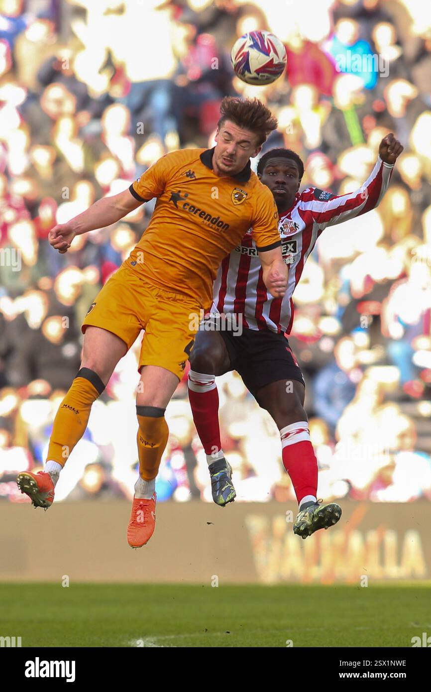 Hull City's Charlie Hughes wins a header during the Sky Bet ...