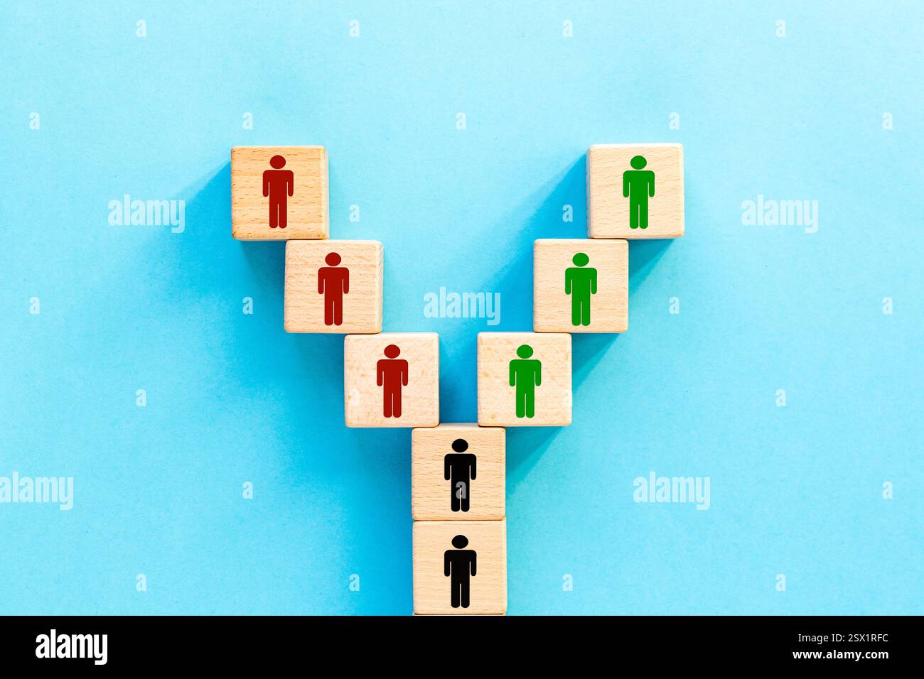 Good or bad choice. People symbols on wooden dice splitting in ...