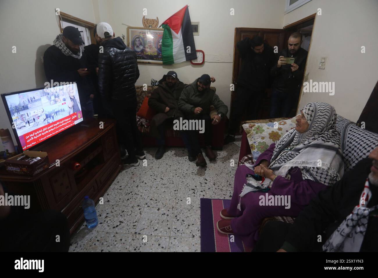 Palestinian Zahdia Khadisha 90 years old watches television to ...