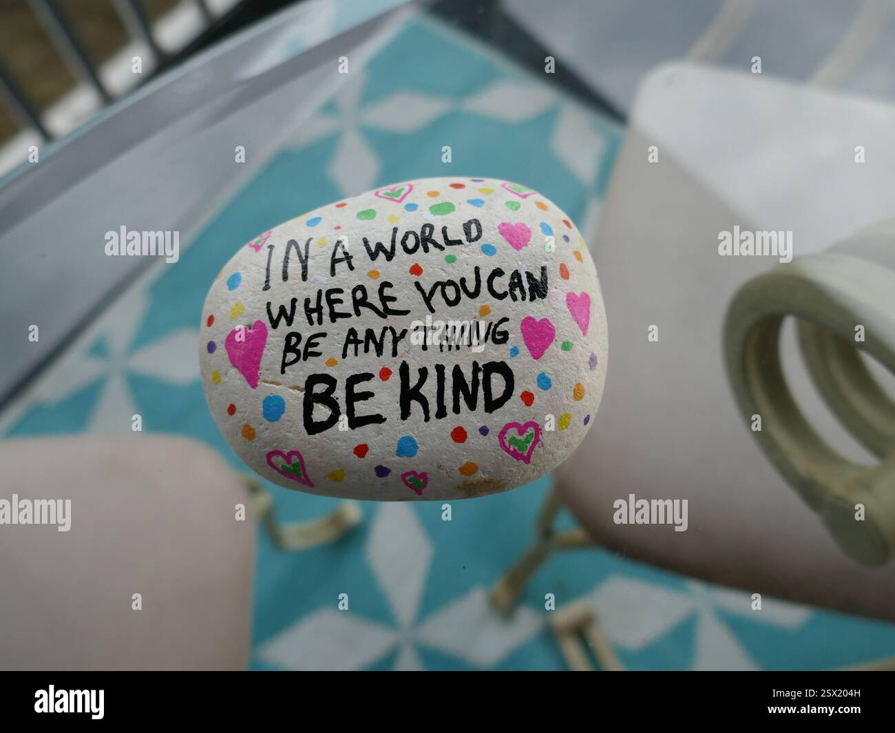 In a world where you can be anything be kind rock close-up on ...