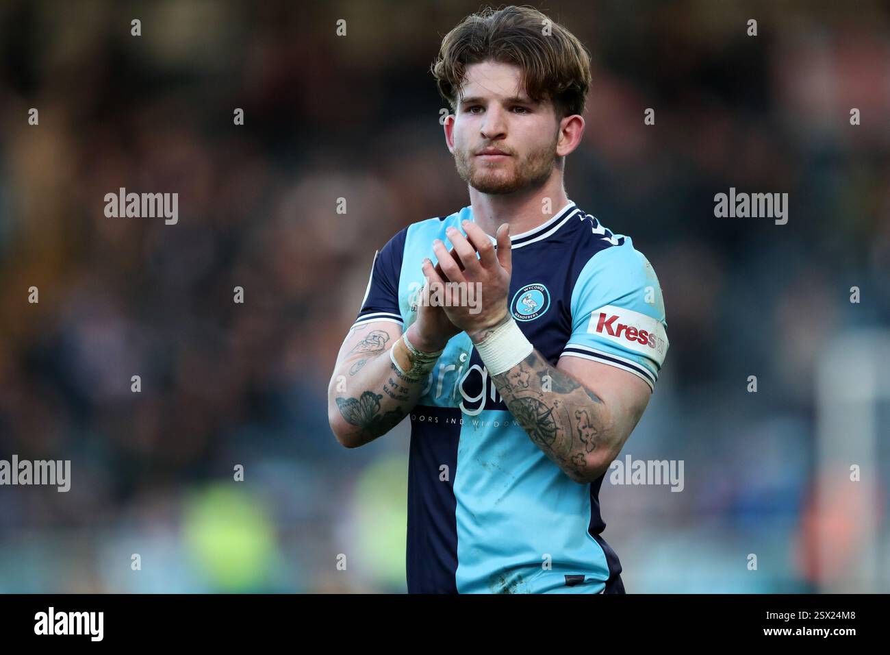 Wycombe Wanderers' Jasper Pattenden applauds the fans following the Sky ...