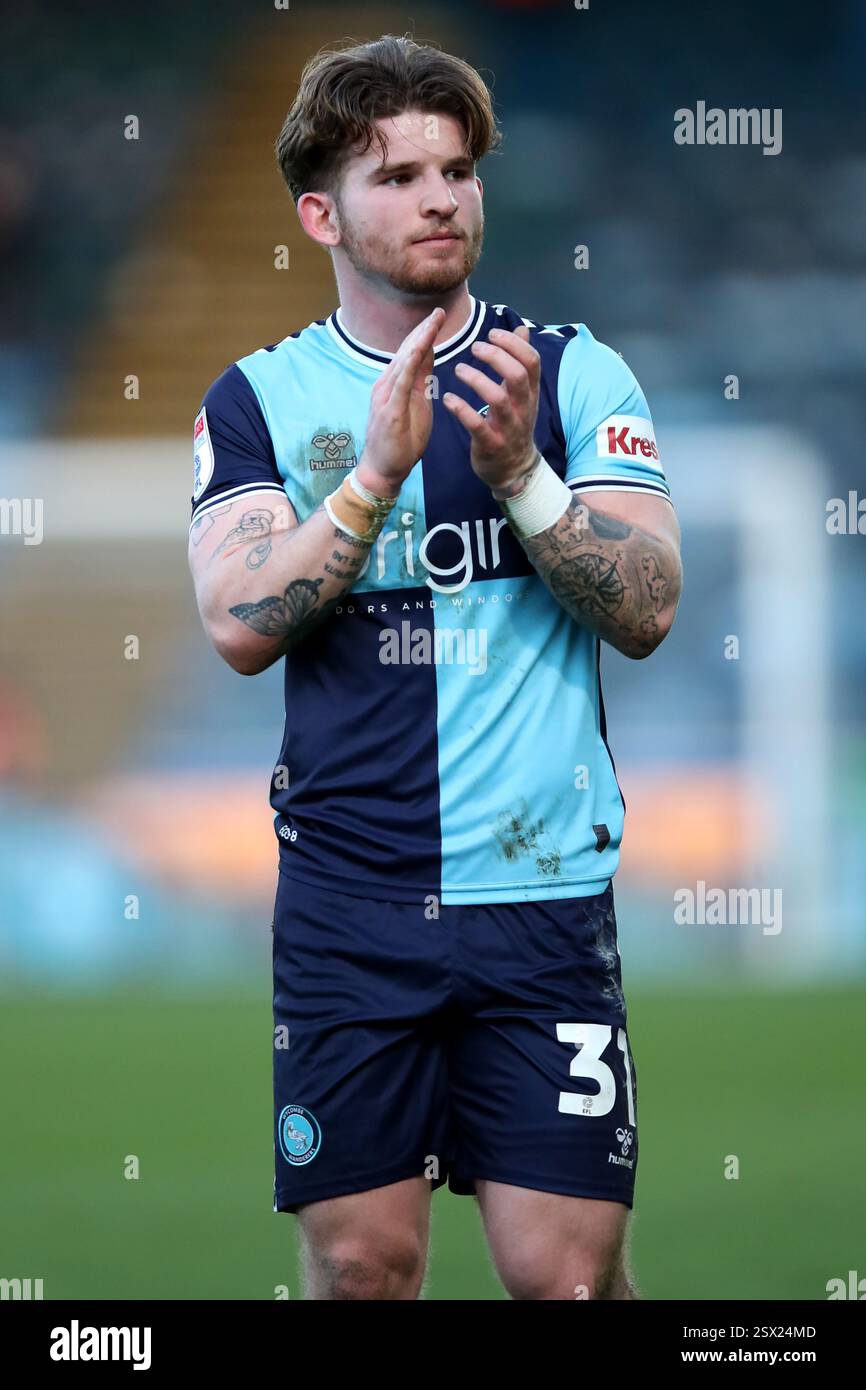 Wycombe Wanderers' Jasper Pattenden applauds the fans following the Sky ...