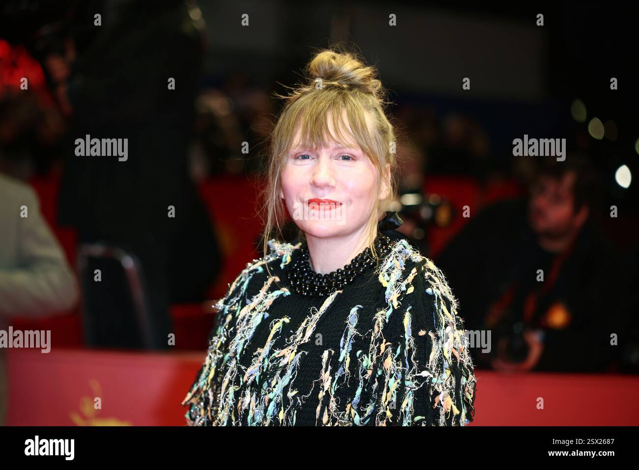 Berlin, Germany. 22nd Feb, 2025. Amy Nicholson, film critic, walks the ...