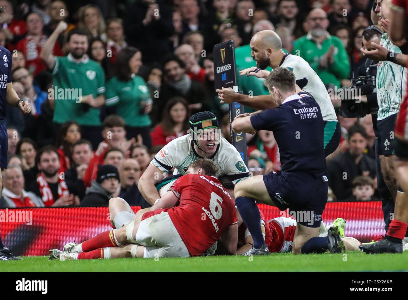 Referee Christophe Ridley signals that the ball was held-up during the ...