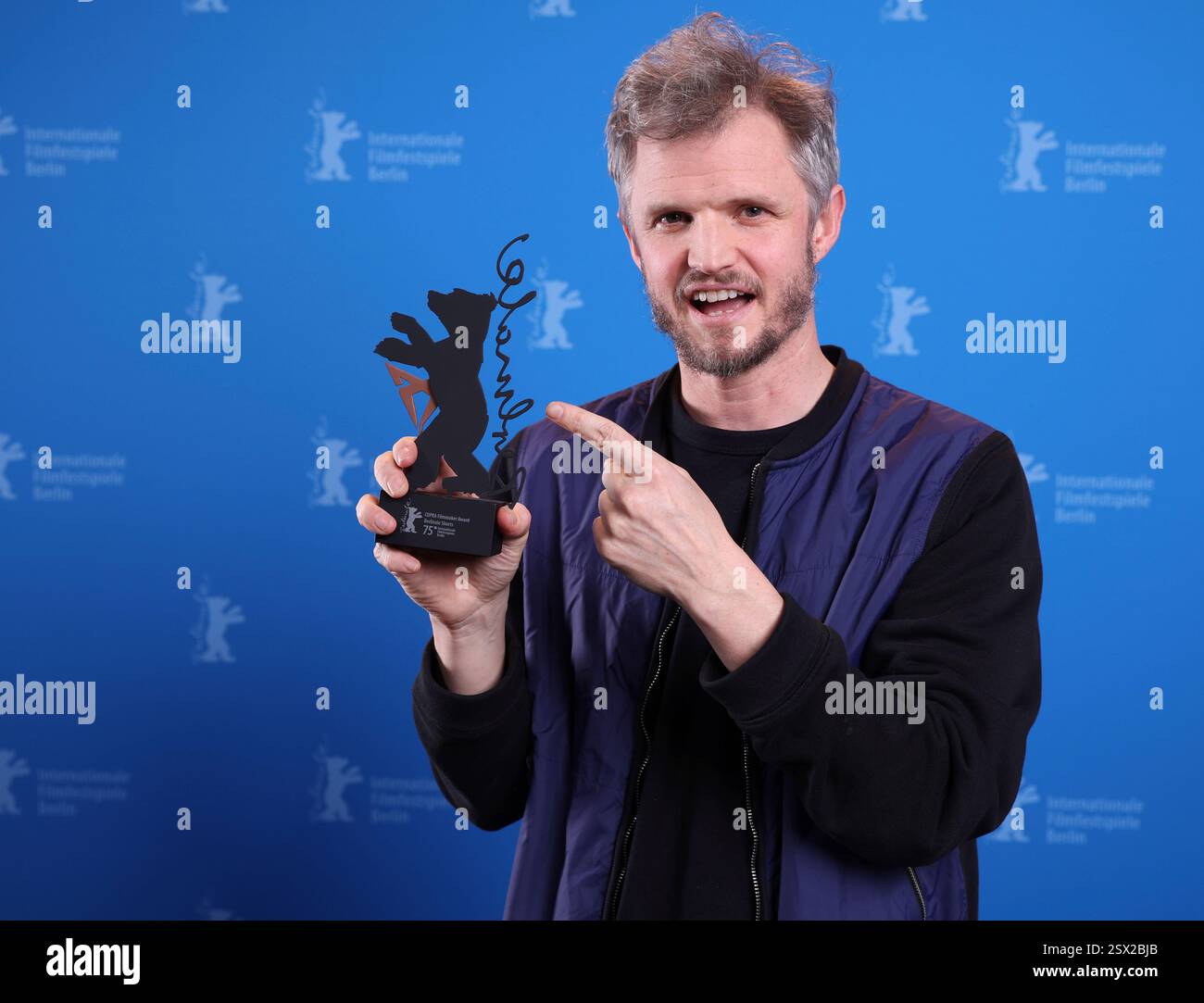 Australia's artist and filmmaker Quenton Miller poses with the ...