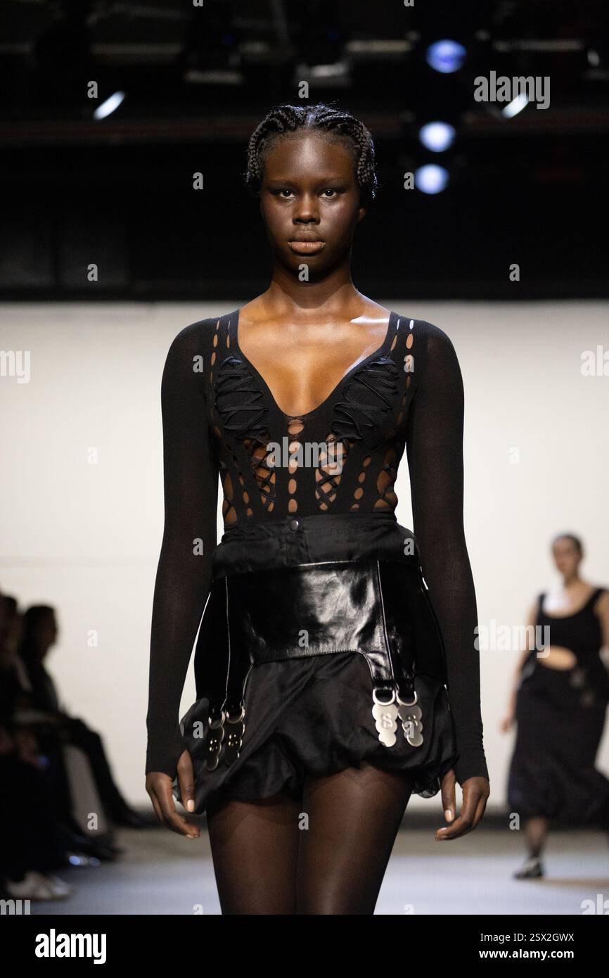 London, UK. Saturday February 22, 2025. A model on the catwalk at the ...