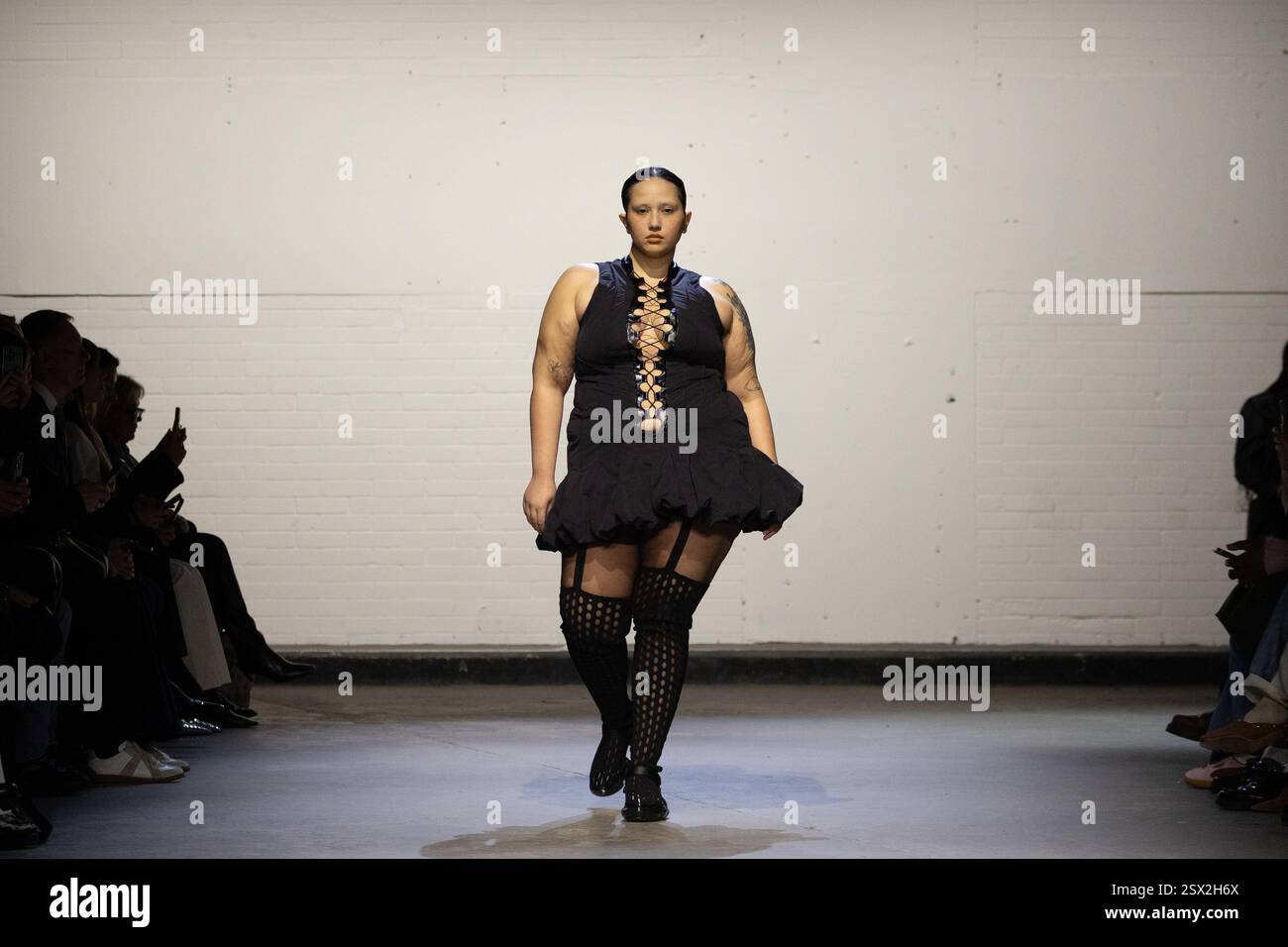 London, UK. Saturday February 22, 2025. A model on the catwalk at the ...