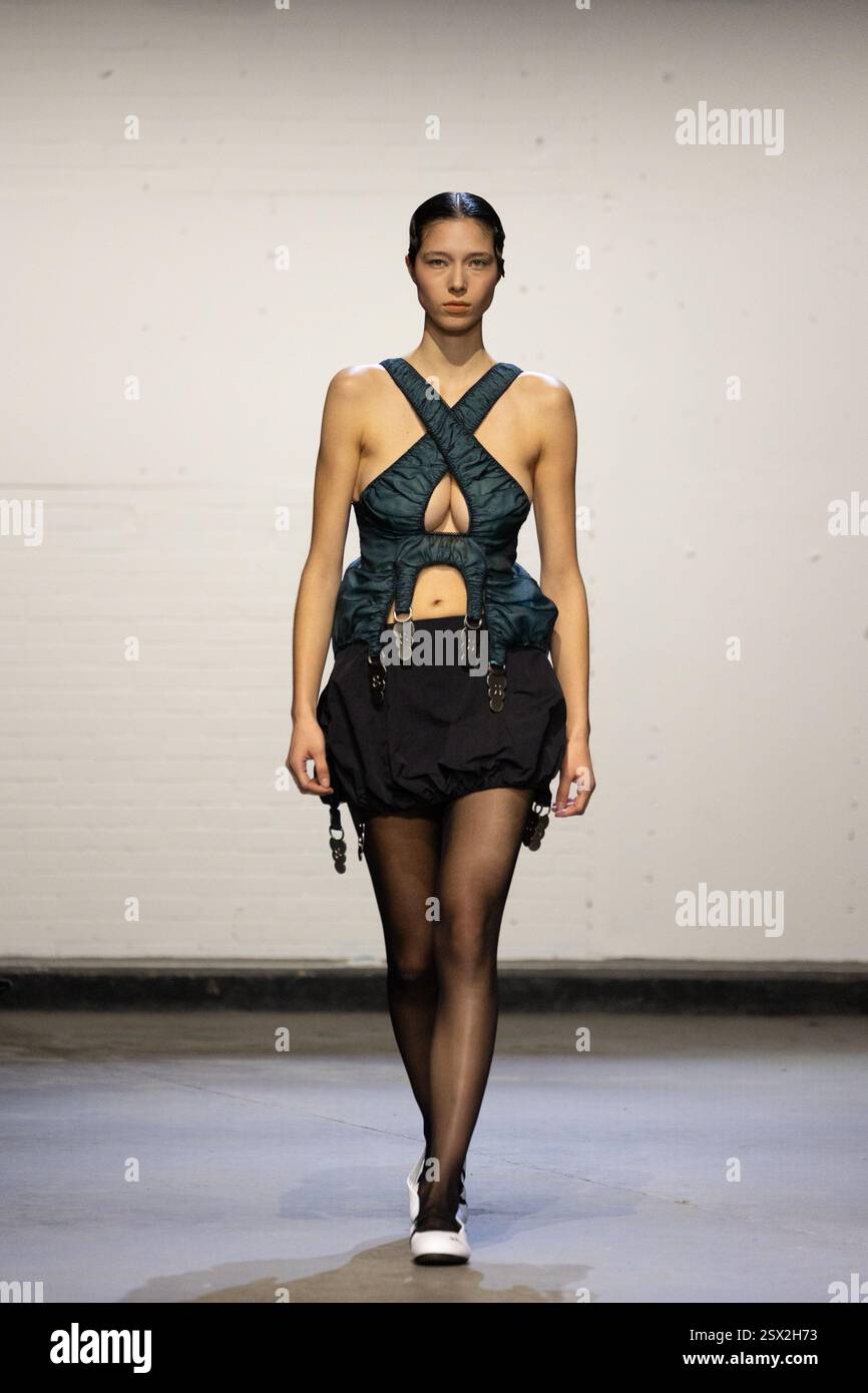 London, UK. Saturday February 22, 2025. A model on the catwalk at the ...