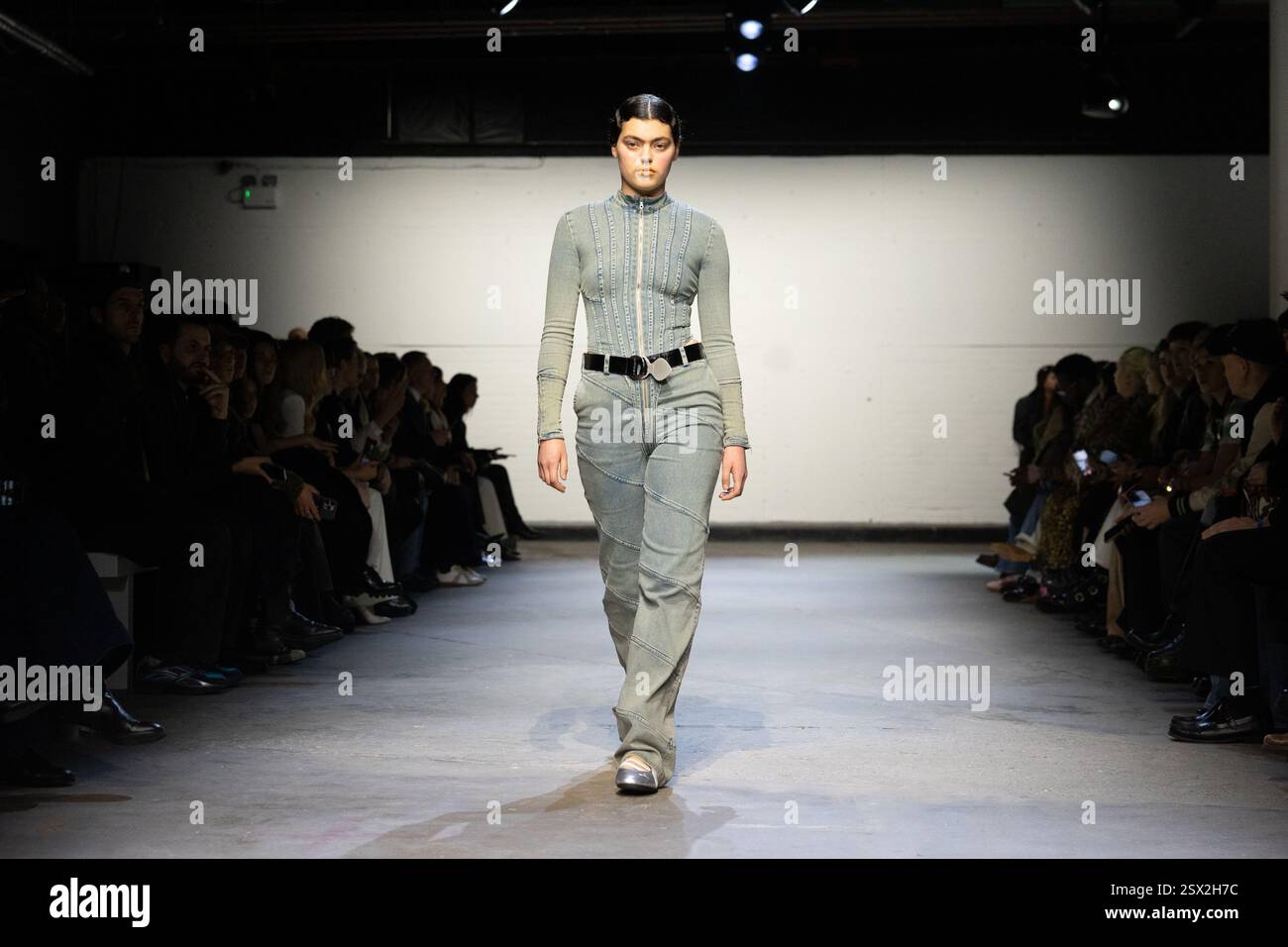 London, UK. Saturday February 22, 2025. A model on the catwalk at the ...