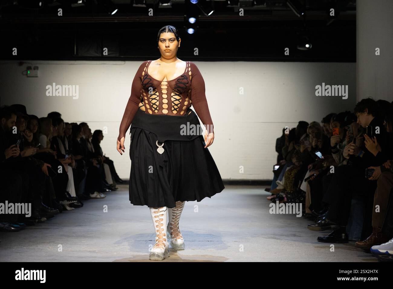 London, UK. Saturday February 22, 2025. A model on the catwalk at the ...