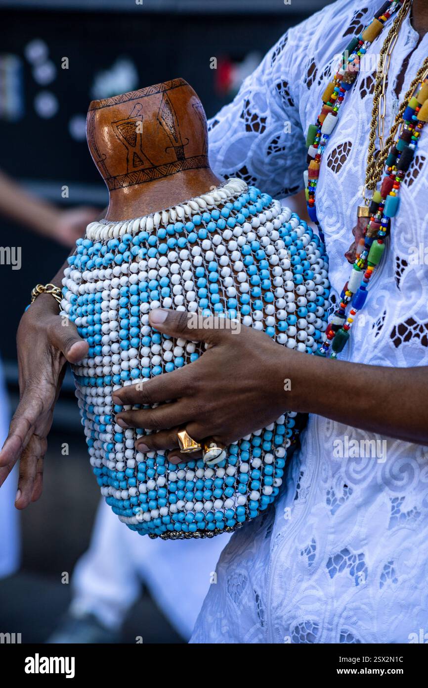 Afro Brazilian shekere beaded gourd drum close-up with colorful beads ...