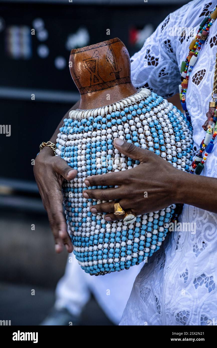 Afro Brazilian shekere beaded gourd drum close-up with colorful beads ...