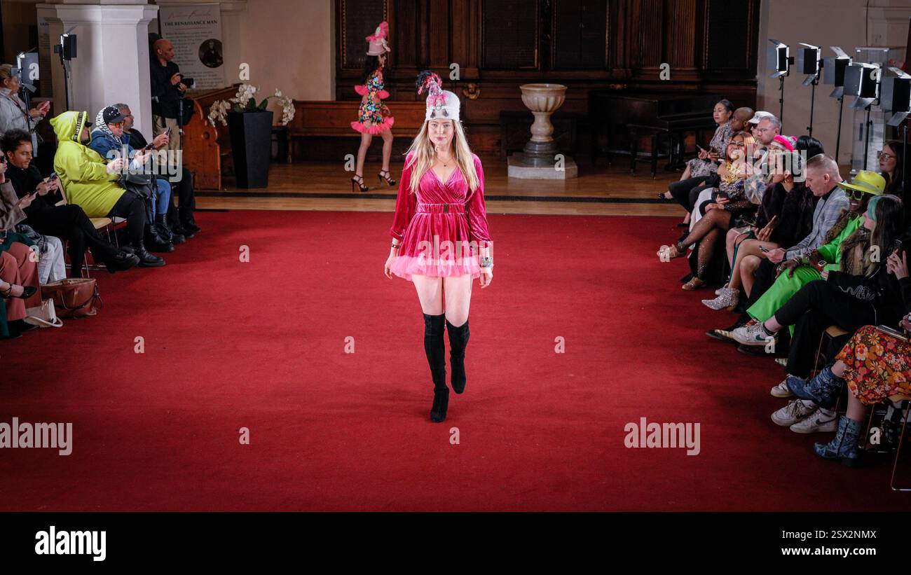 London, UK. 22nd Feb 2025. Models pose and walk the runway at a fashion ...