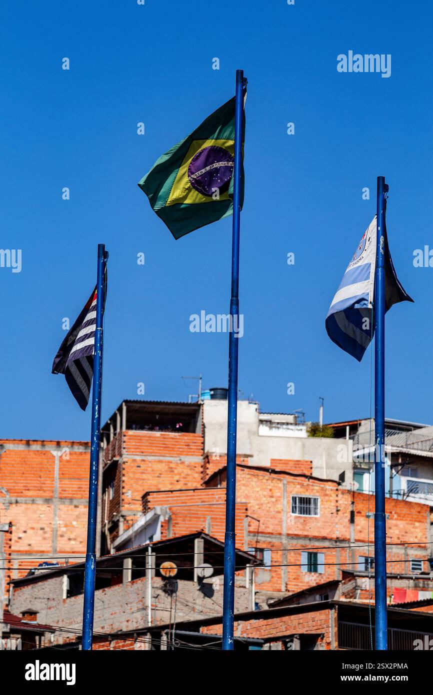 flags of the state of Sao Paulo, Brazil and Diadema with a favela view ...