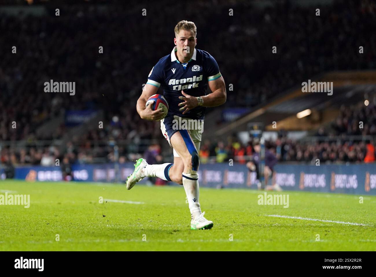Scotland's Duhan van der Merwe runs clear to score a try during the ...