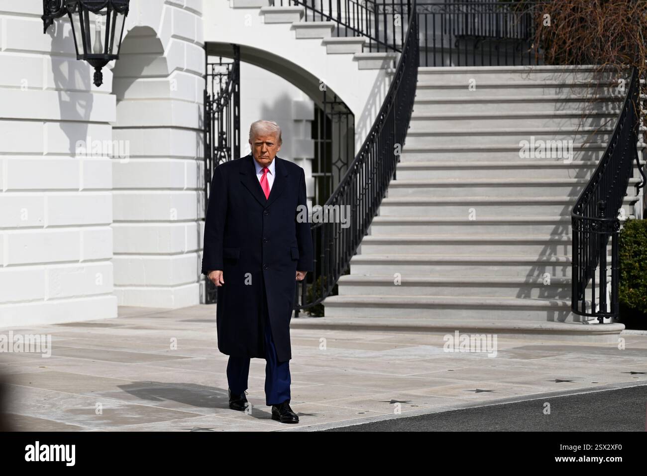 President Donald Trump leaves the White House before departing on ...