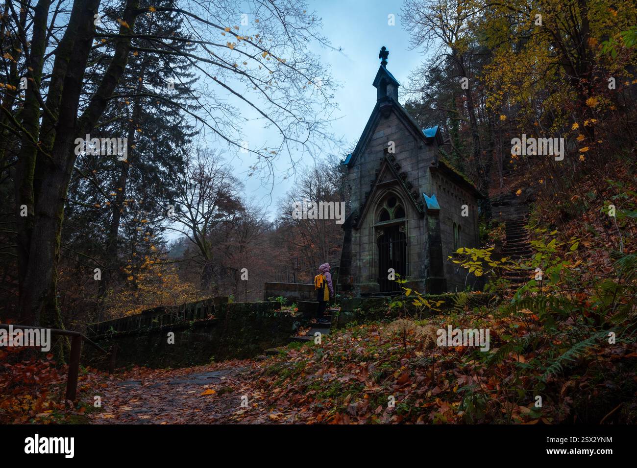 Epic old chapel with graveyard hidden in the forest with amazing moody ...