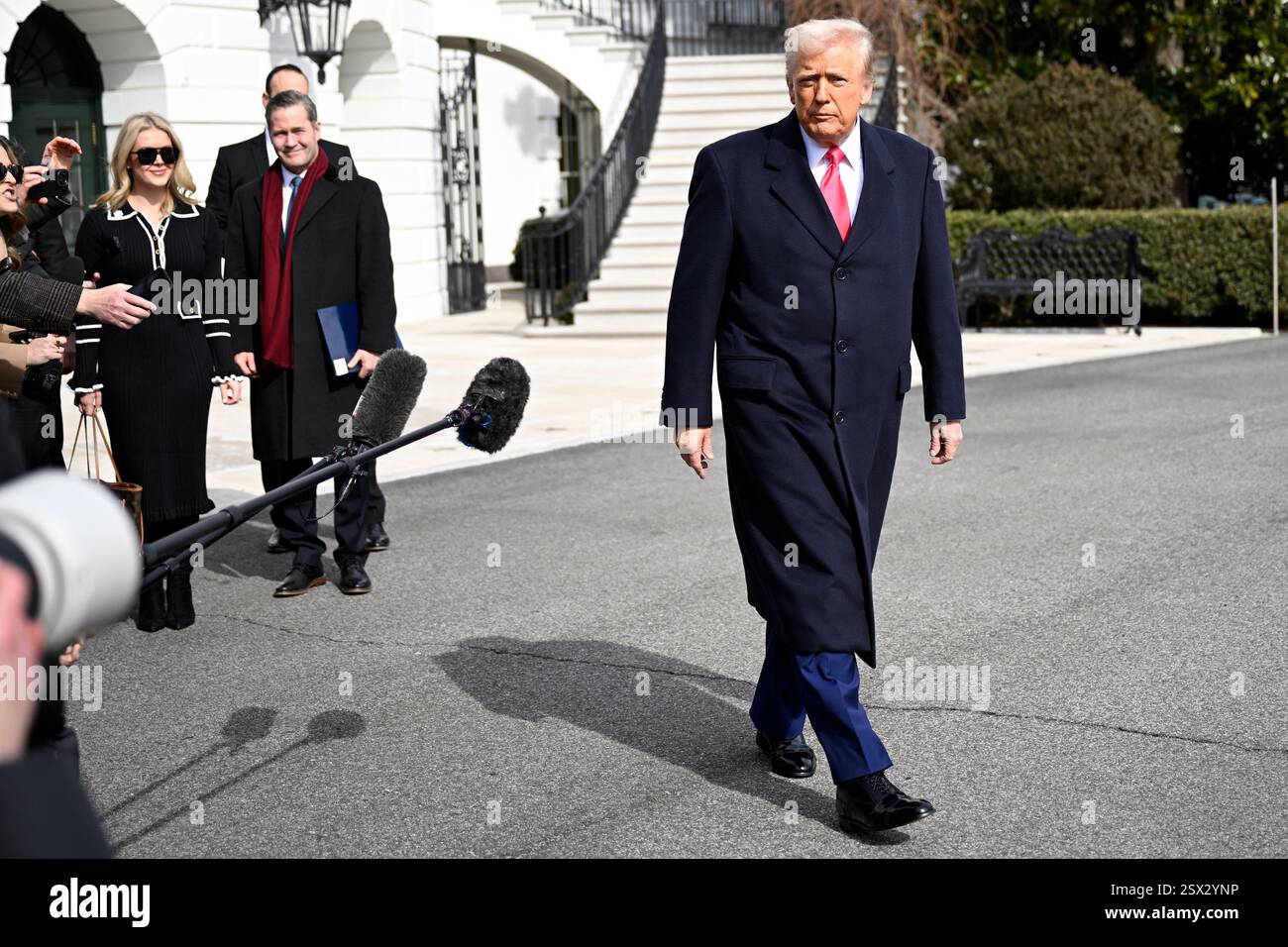 President Donald Trump leaves the White House before departing on ...